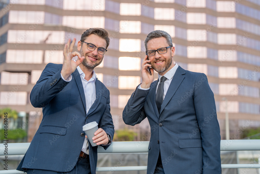 Business success men outdoor. Two business men on business meeting in ...