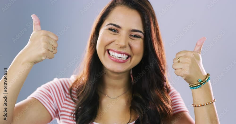 Face, smile and woman with thumbs up, support and positive mindset ...