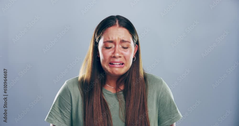 Sad, face and woman with tears in studio with a broken heart after ...