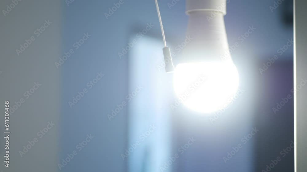 Turning the Light On a Led Bulb, Turn On the Light in a Dark Room, Girl ...