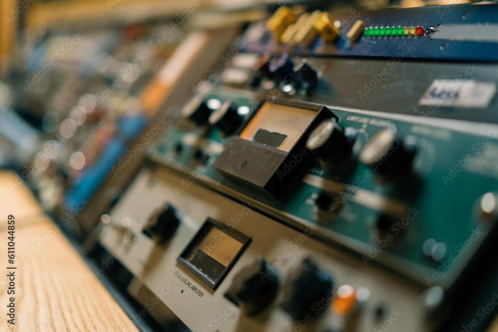 old displays of professional analog volume meters in a recording studio ...