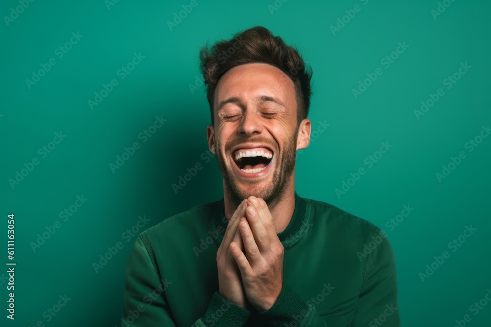 Close-up portrait photography of a glad boy in his 30s placing the hand ...