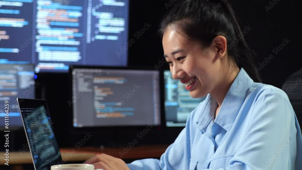Close Up Side View Of Asian Female Programmer Drinking Coffee While ... Close Up Side View Of Asian Female Programmer Drinking Coffee While ...