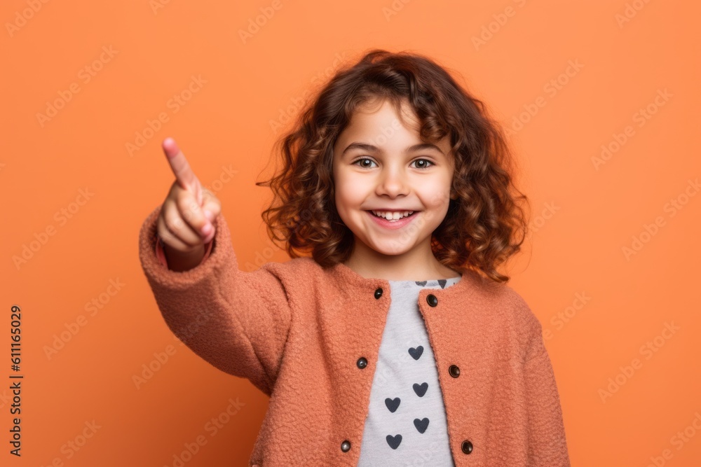 Medium shot portrait photography of a happy kid female raising a finger ...