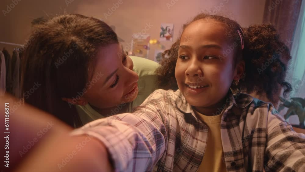 Handheld Pov Of Cool African American Preteen Girl With Modern Mom Recording Vlog At Home In