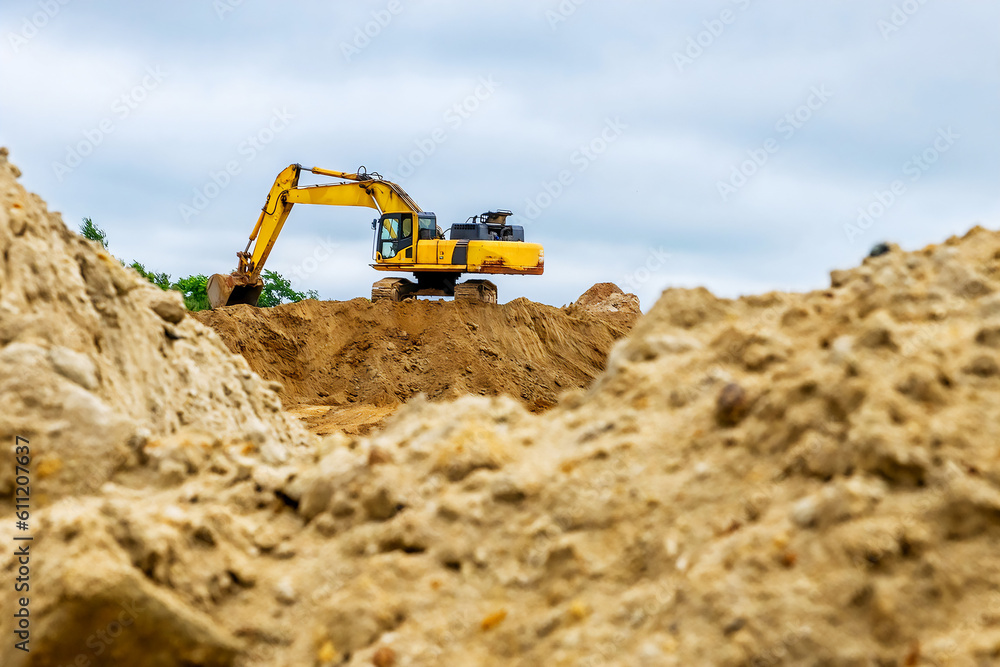 Excavator at the construction site. Concept of land works and site ...