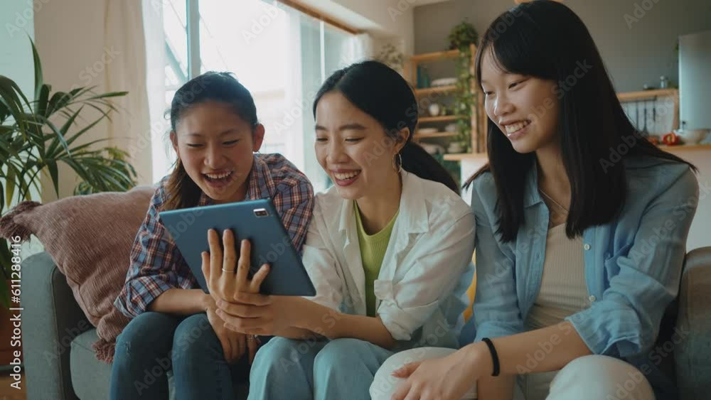 Group of female friends enjoying life and having fun at home. Girls day ...