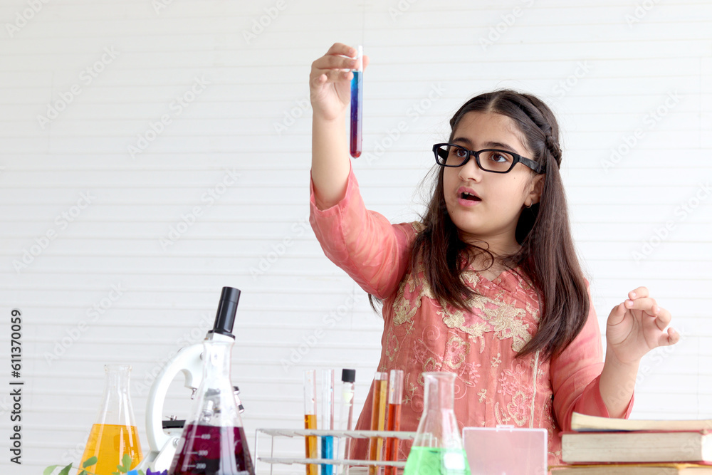 Cute Indian school girl in India traditional dress costume doing ...