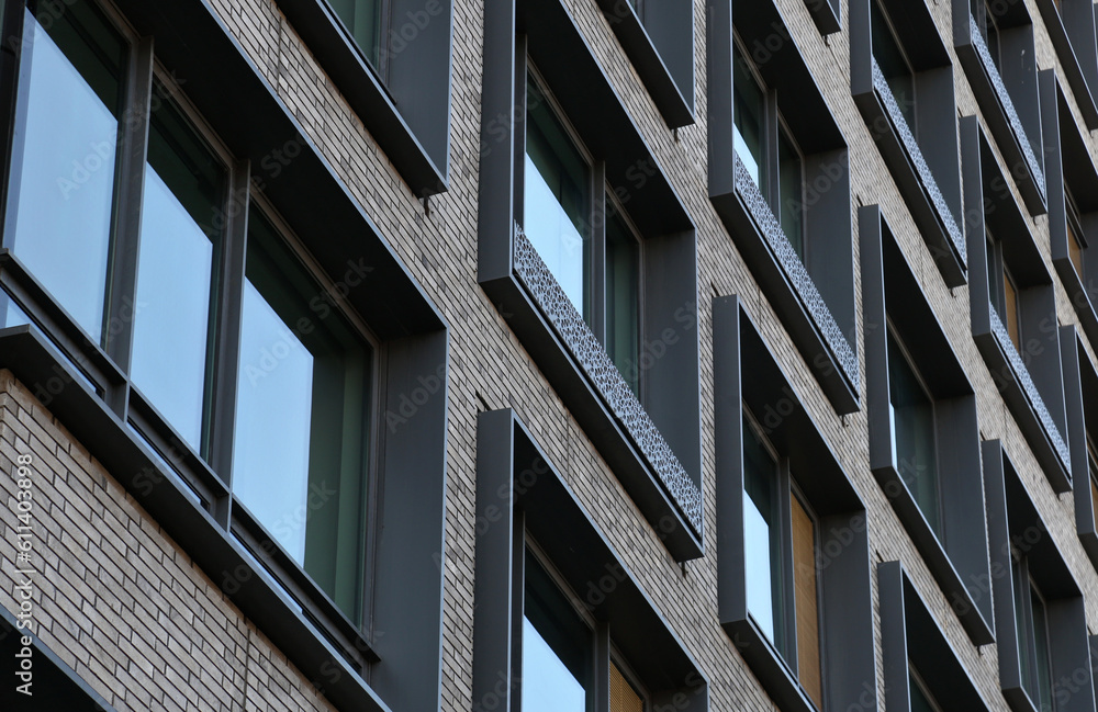 tall residential building detail (windows, lines, symmetry, asymmetry ...