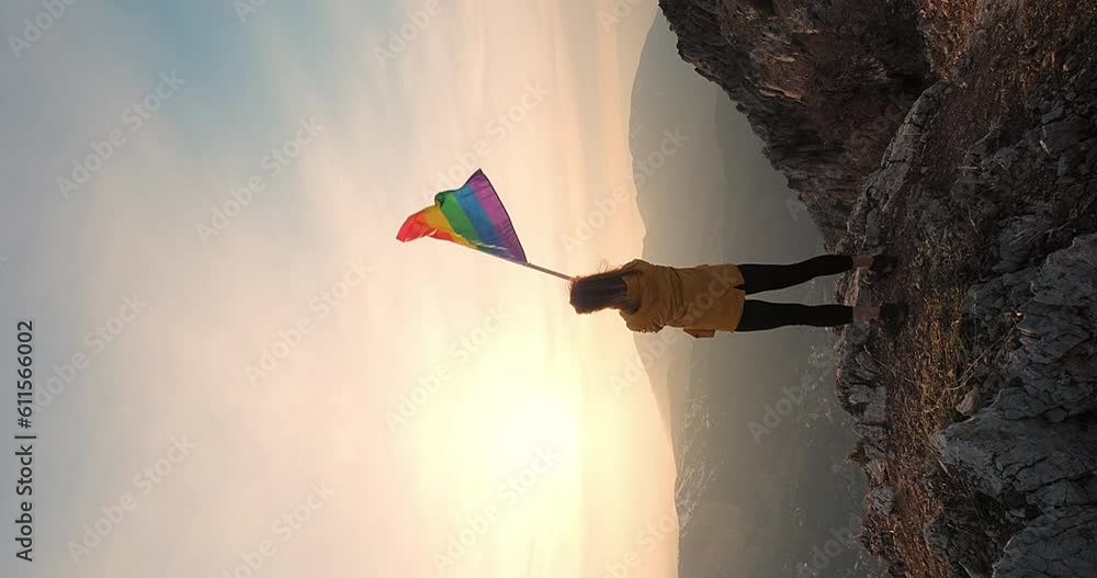 Pride Month LGBTQI plus Flag Flying in the Wind on Mountain Background ...