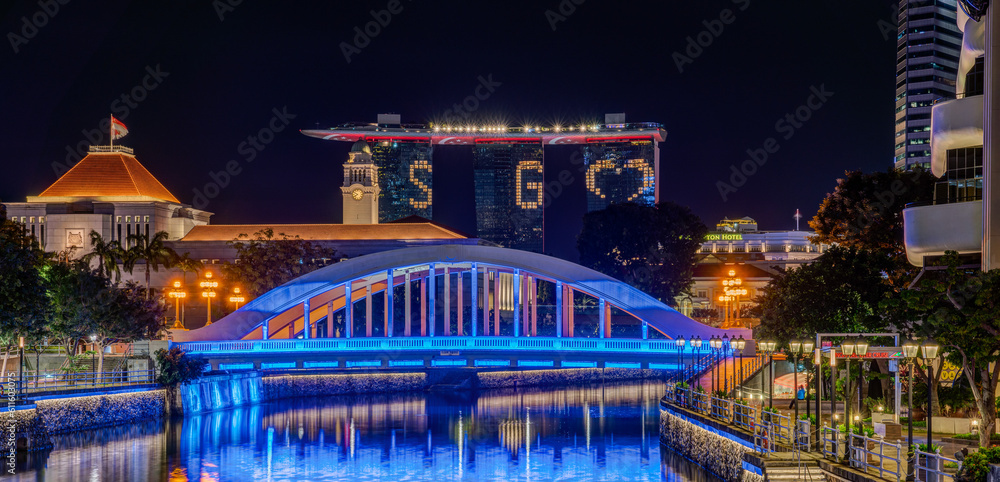 SINGAPORE - April 14 2020 : Illuminated Elgin Bridge and Marina Bay ...