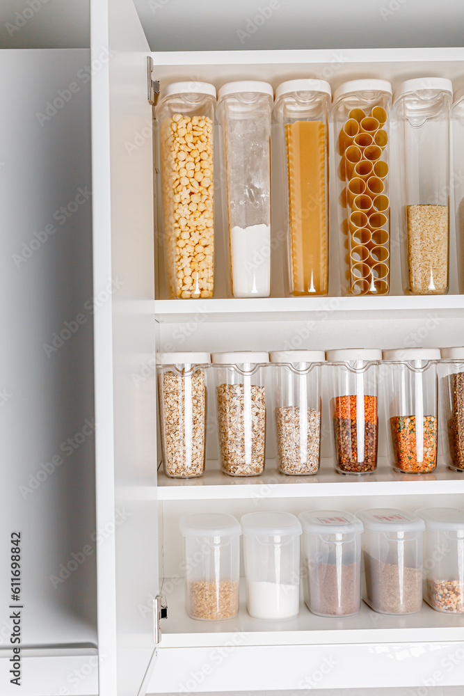 Stocked kitchen pantry with food. The organization and storage in a ...