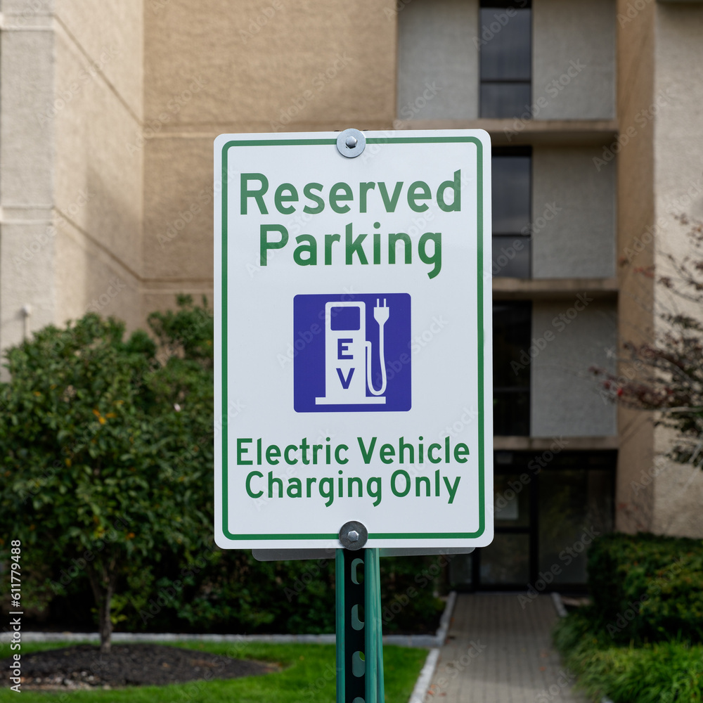 Reserved Parking Electric Vehicle Charging Only sign with pictograph ...
