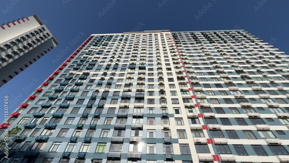 Exterior of a newly built modern high-rise residential complex of multi ...