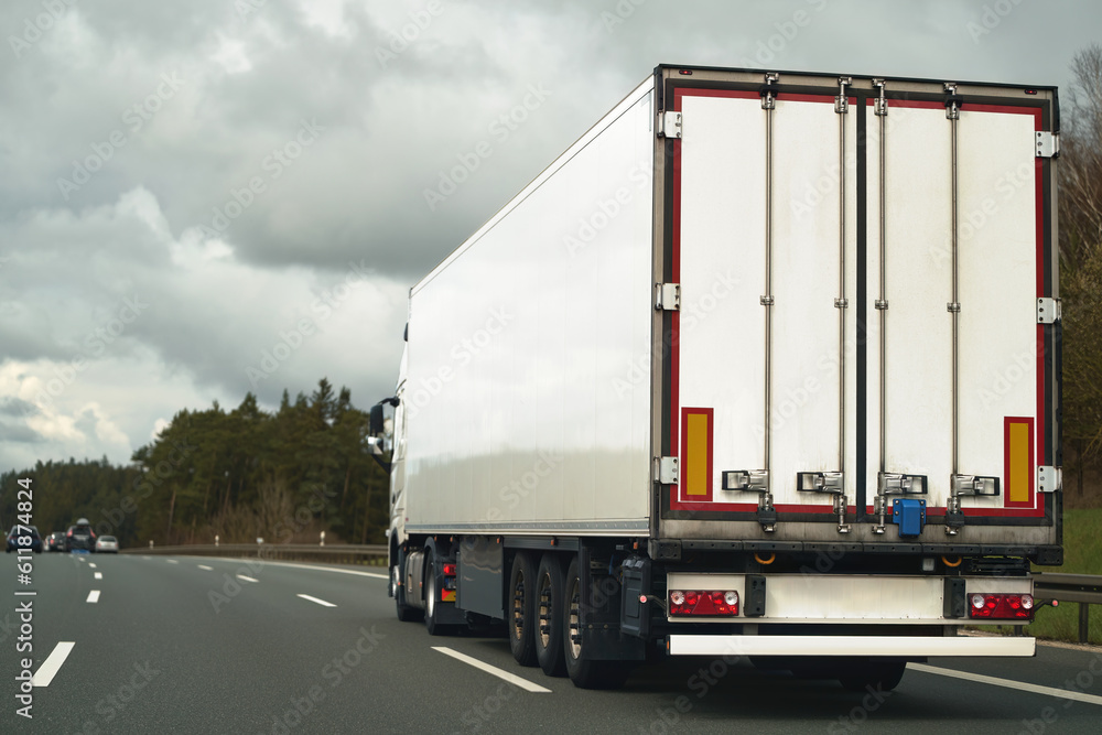 Delivery truck on the Europe highway. Semi-truck with cargo trailer ...