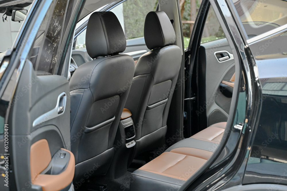 inside the back seat The passenger seat is wide and clean. Leather ...