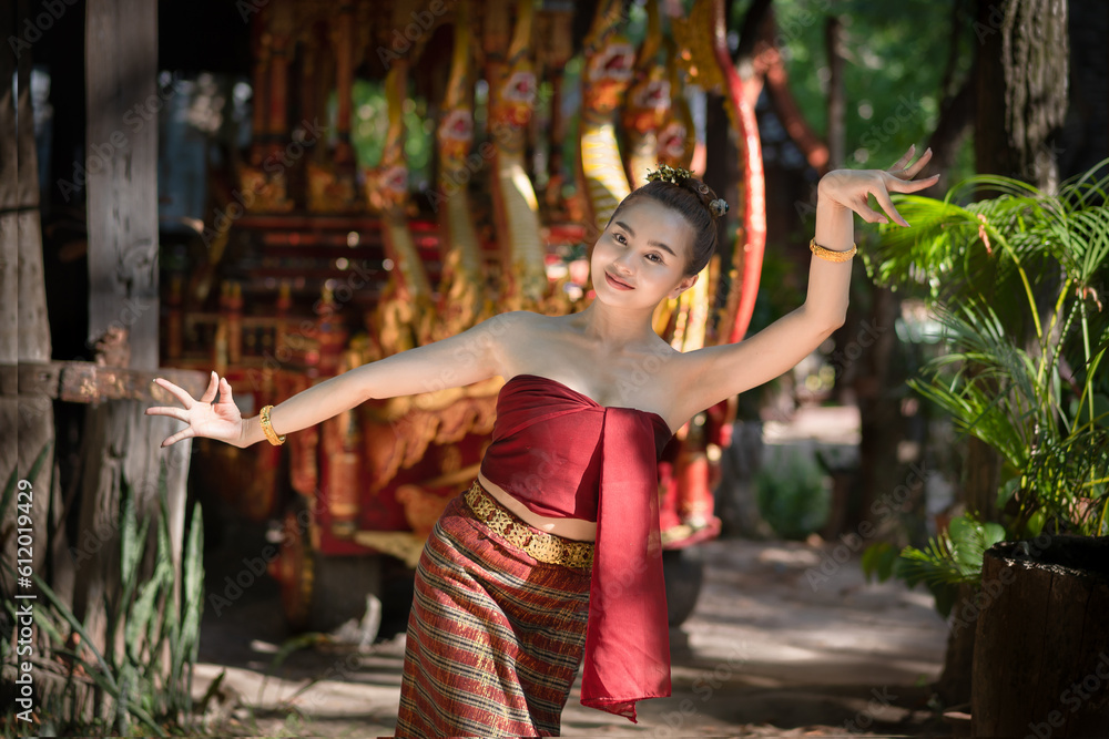 Poster Beautiful Asian woman wearing ancient native Thai traditional ...