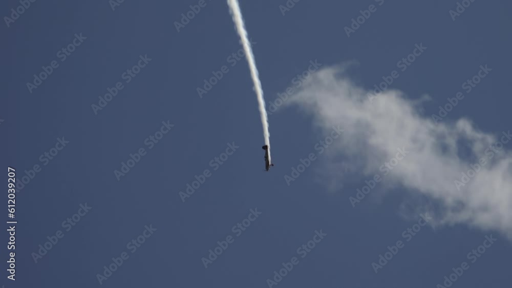 Private plane crash. A small plane during an aerobatic simulation ...