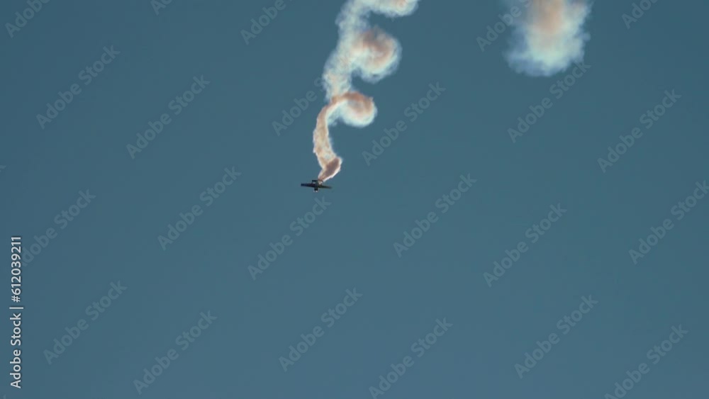 Private plane crash. A small plane during an aerobatic simulation ...