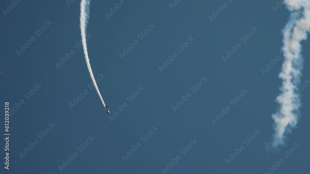 Private plane crash. A small plane during an aerobatic simulation ...