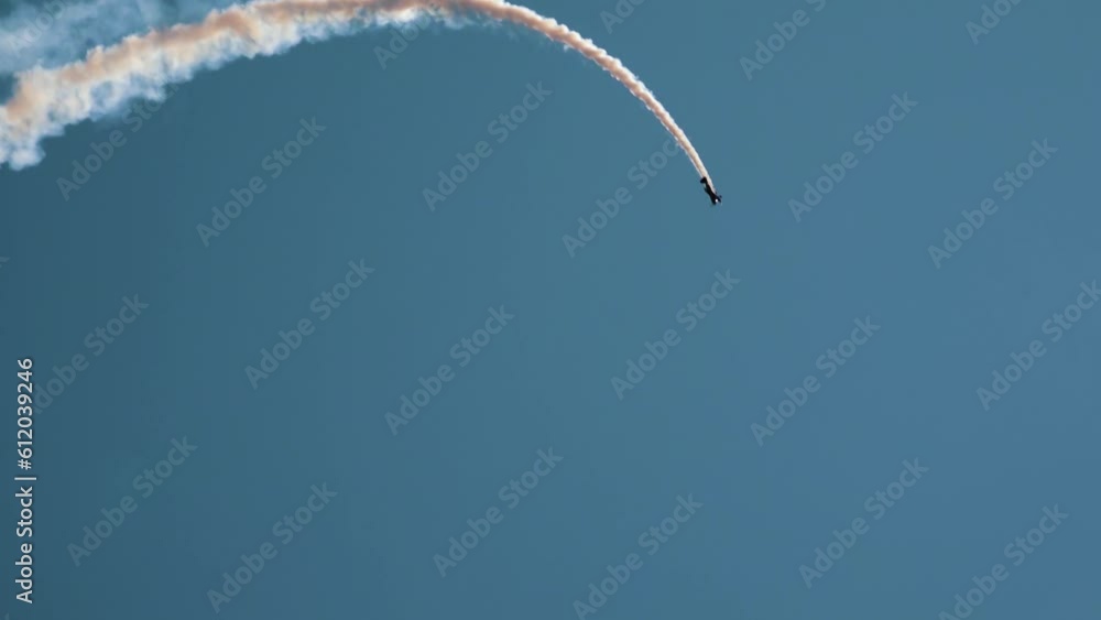 Private plane crash. A small plane during an aerobatic simulation ...