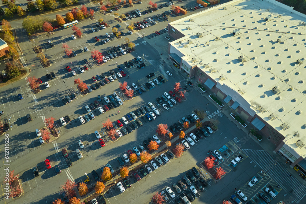 View from above of american grocery store with many parked cars on ...