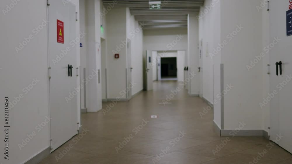 Smooth camera movement. industrial interior long corridor, deep passage ...