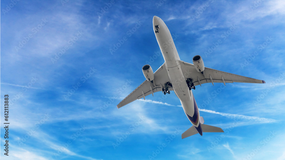 Airplane and sky, the plane is landing. Airplane take off on the blue ...