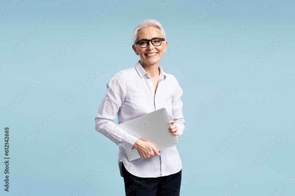 Smiling confident gray haired woman wearing stylish eyeglasses holding ...