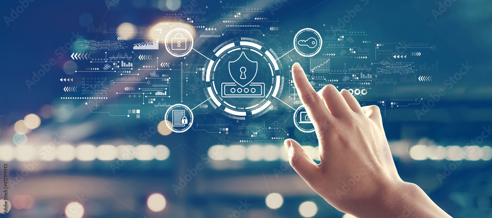 Cyber security theme with hand pressing a button on a technology screen ...