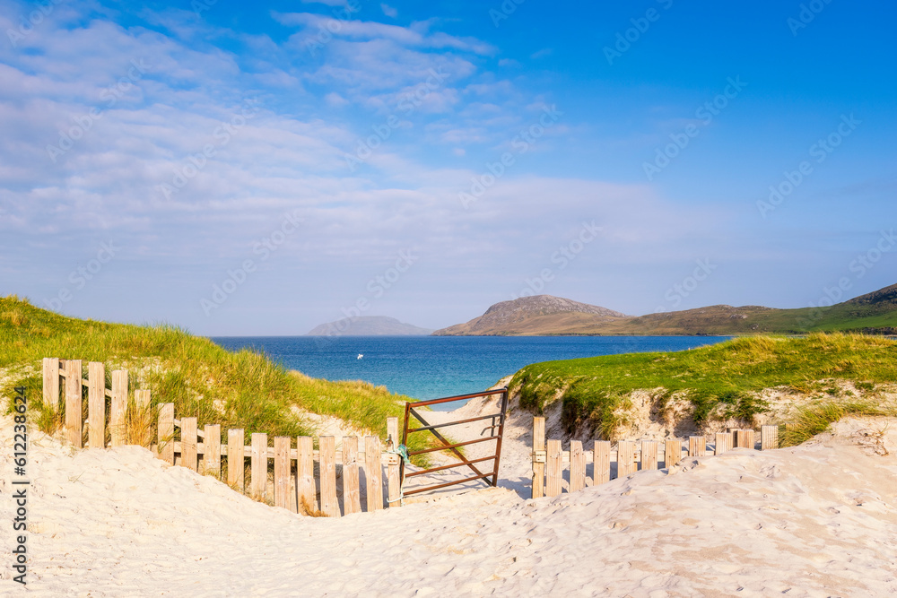 UK, Scotland, Traigh a Bhaigh, Coastal fence on Barra island Stock ...