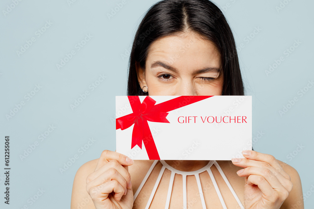 Young woman wear swimsuit hold cover eye with store gift certificate ...