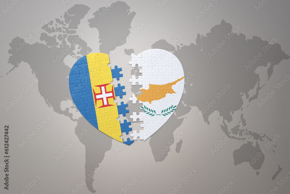 puzzle heart with the national flag of cyprus and madeira on a world ...