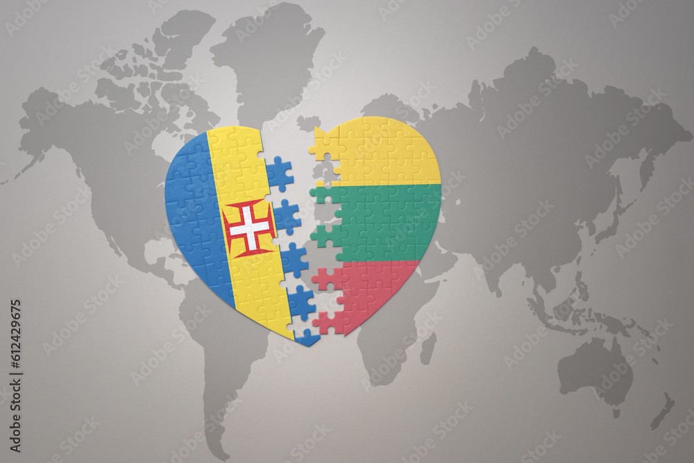 puzzle heart with the national flag of lithuania and madeira on a world ...