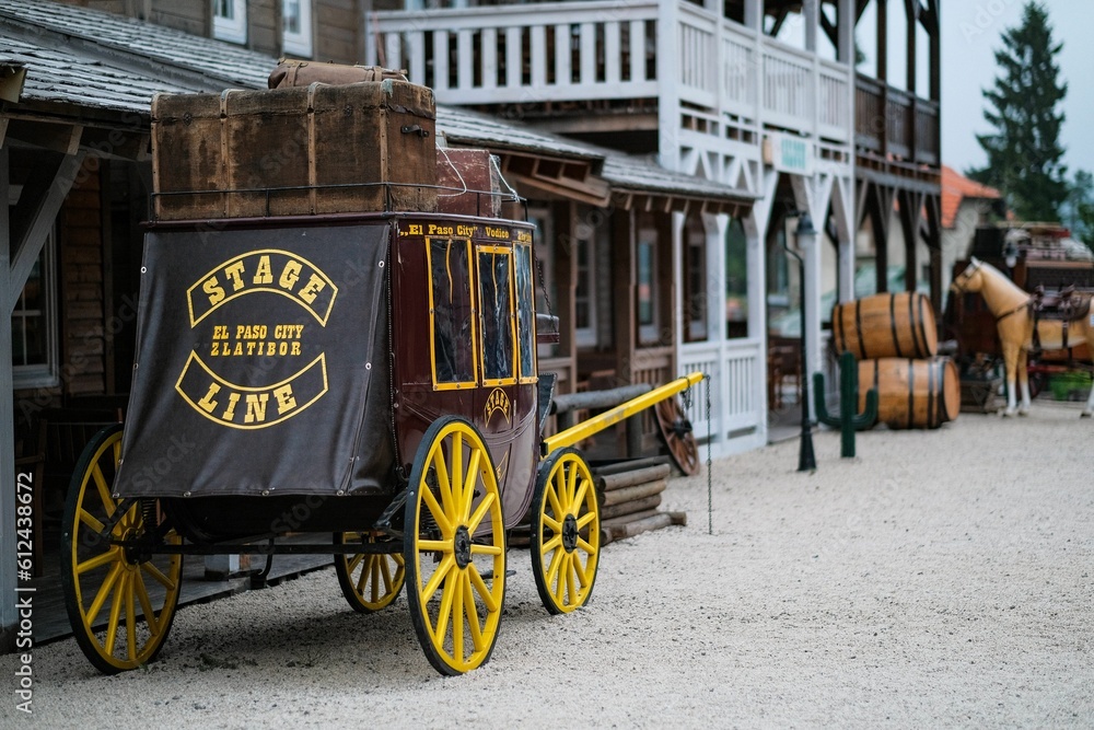 Old horse carriage in the streets of the Wild West village theme park ...