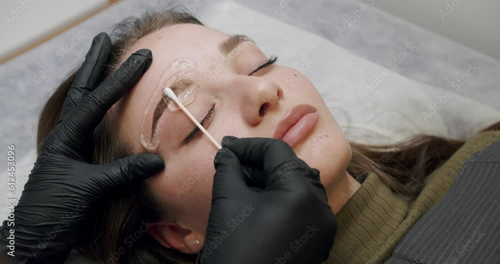 Microblading, permanent makeup tattoo close up. Master makes permanent ...