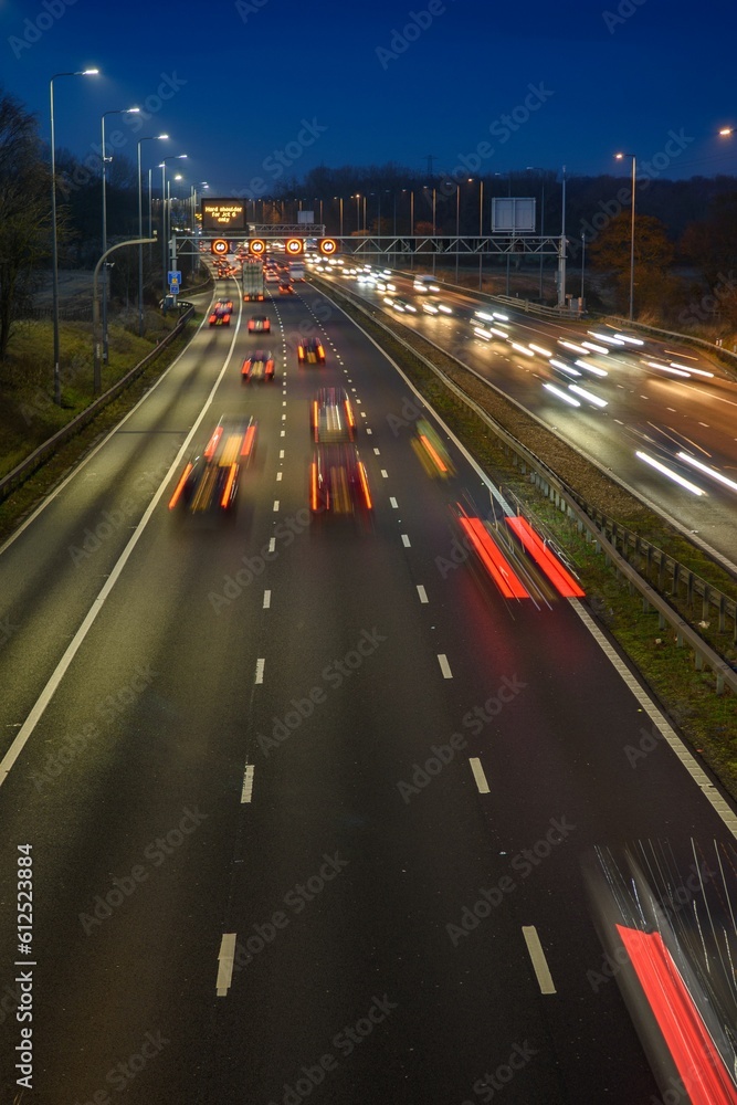 Fast moving traffic on the M42 passes through an active traffic ...