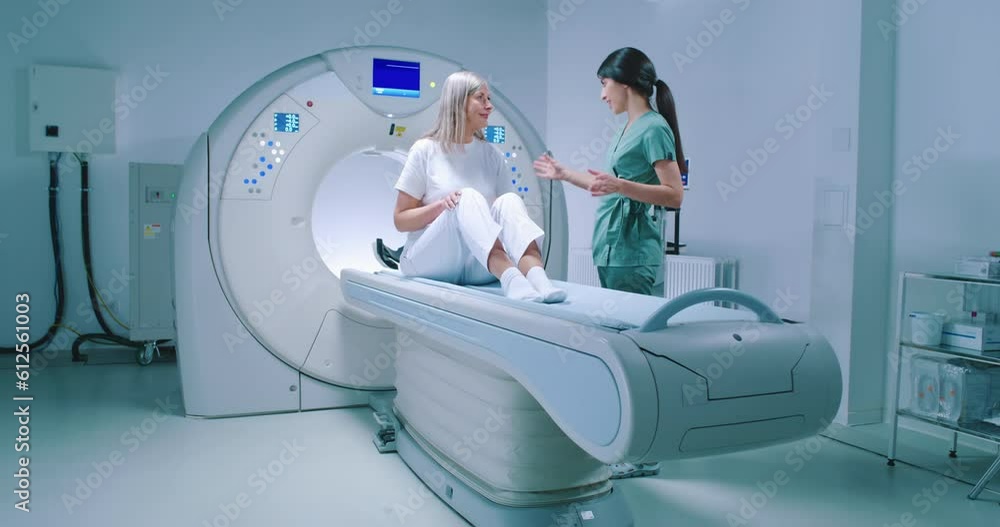 Smiling patient is getting recommendations from doctor before ...