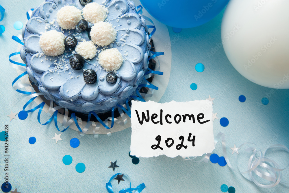 Welcome 2024 - card with text on blue background with cake and air ...
