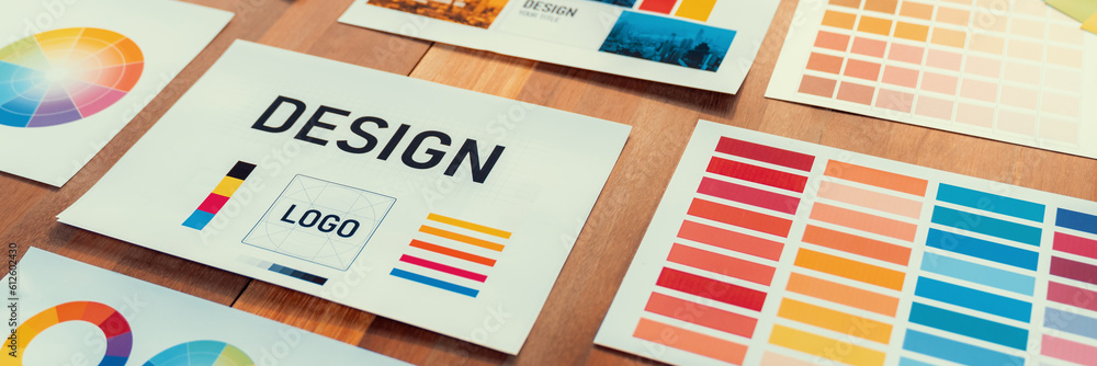 Panorama shot of various color palette idea papers arranged neatly on ...