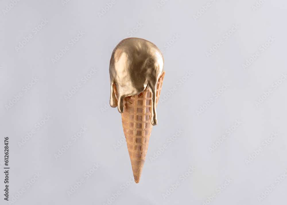 Gold metallic ice cream cone melting isolated on white background Stock ...