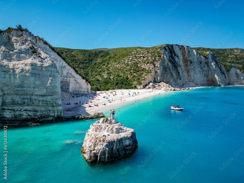 (4K) Couple holding hands at Fteri Beach, Kefalonia, Cephalonia, Greece ...