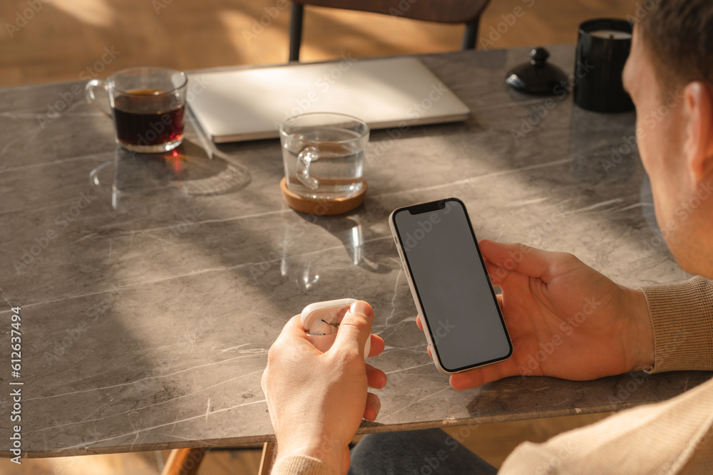 Faceless person using smartphone to check message Stock Photo | Adobe Stock