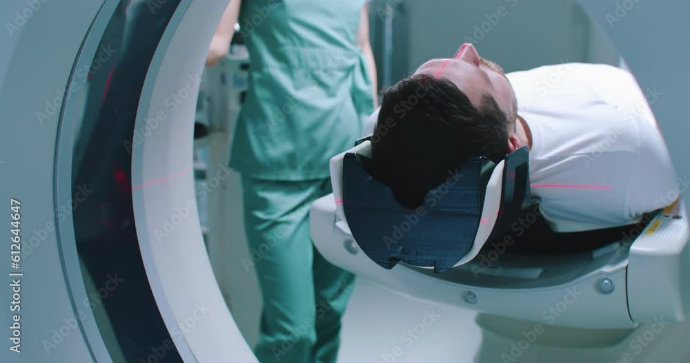 Close-up back shoot of male patient after magnetic resonance imaging ...