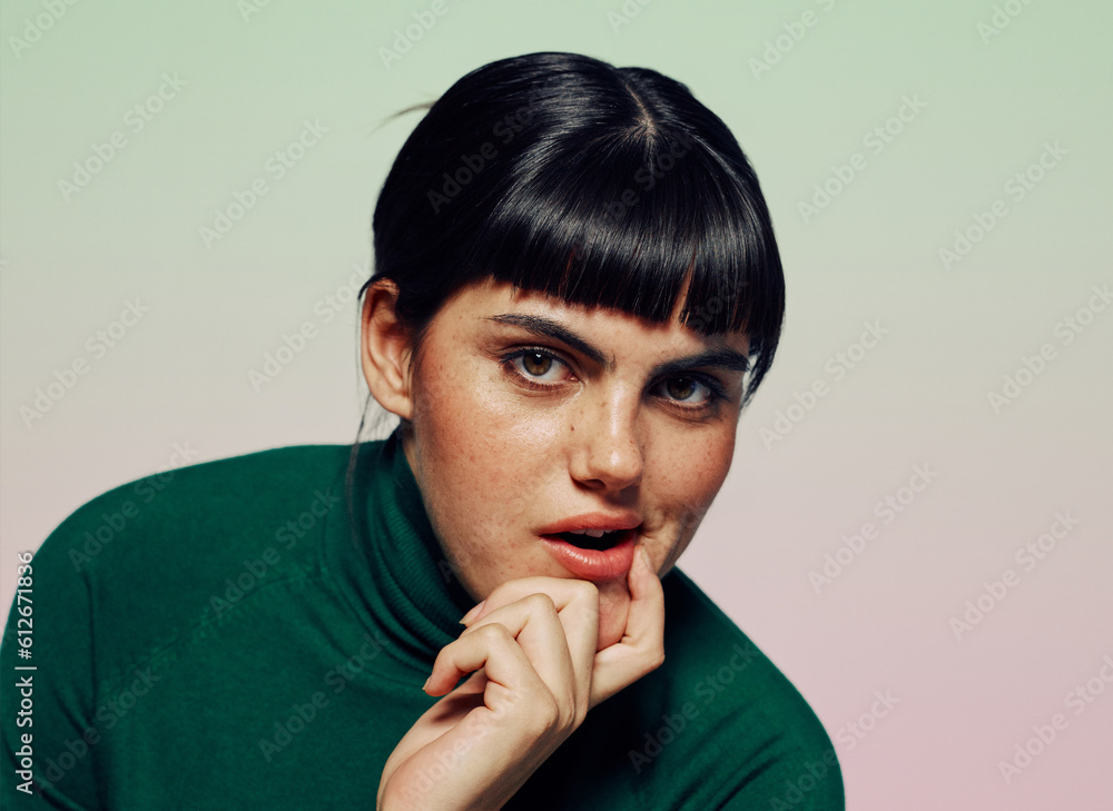 Cheeky mood close up portrait of woman over pastel color background ...