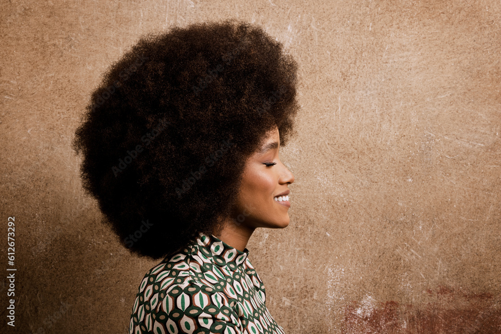 Side view of beautiful black woman with afro hair Stock Photo | Adobe Stock