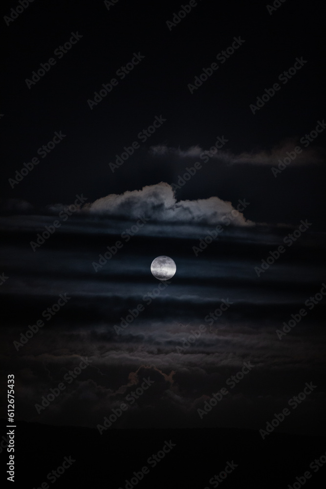 Full moon with clouds Stock Photo | Adobe Stock