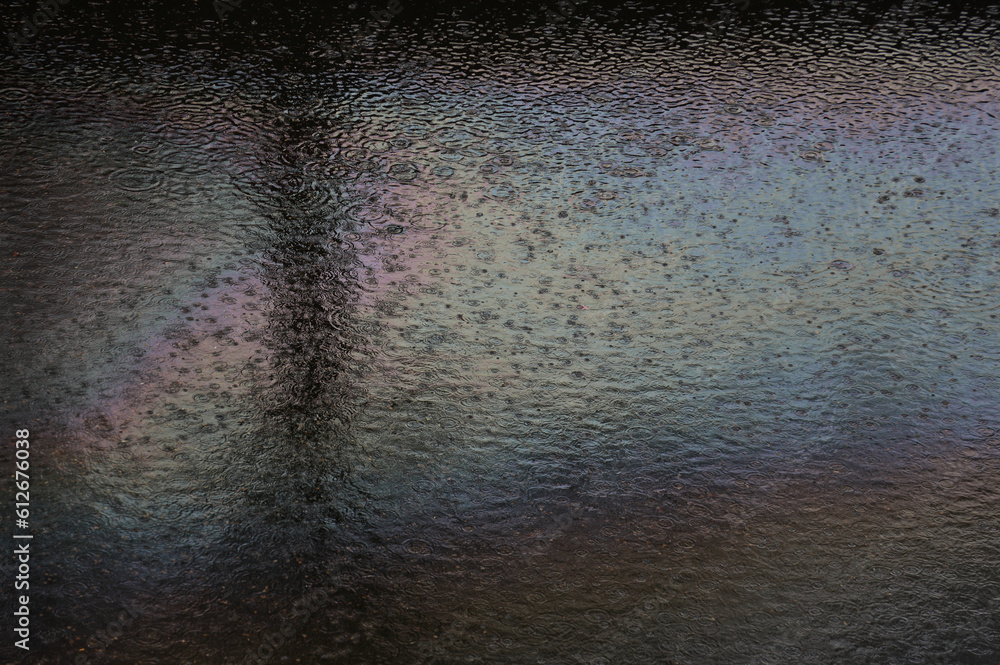 petrol floating on water Stock Photo | Adobe Stock