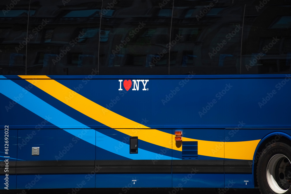 MTA NYC bus logo on a blue and white color omnibus in NYC. Taken on May ...