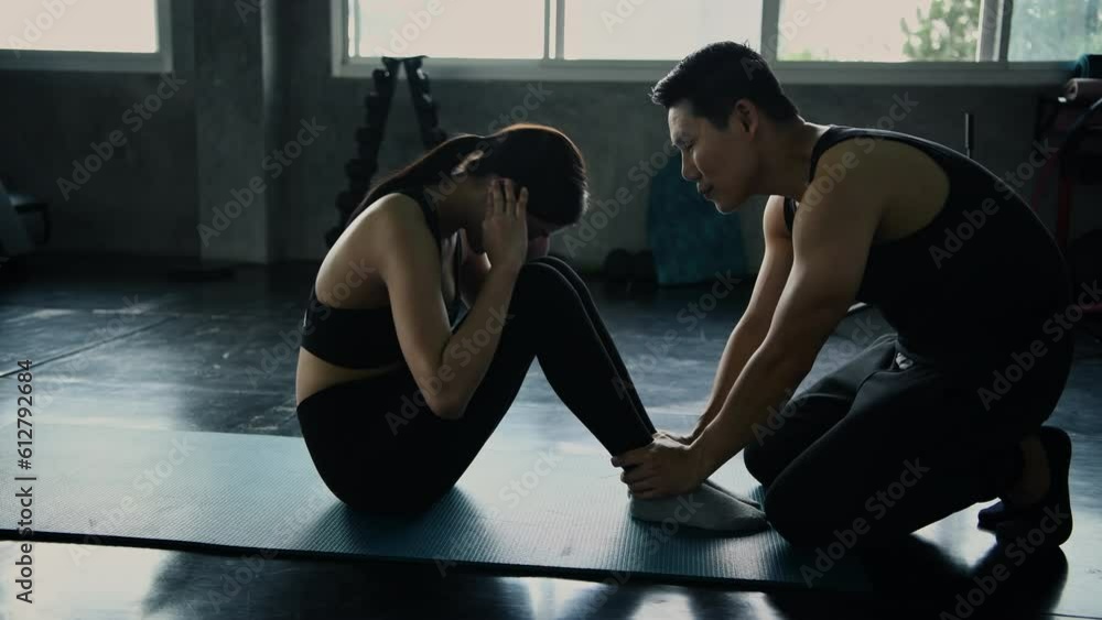 Fitness concept of 4k Resolution. Asian female athlete doing sit ups ...